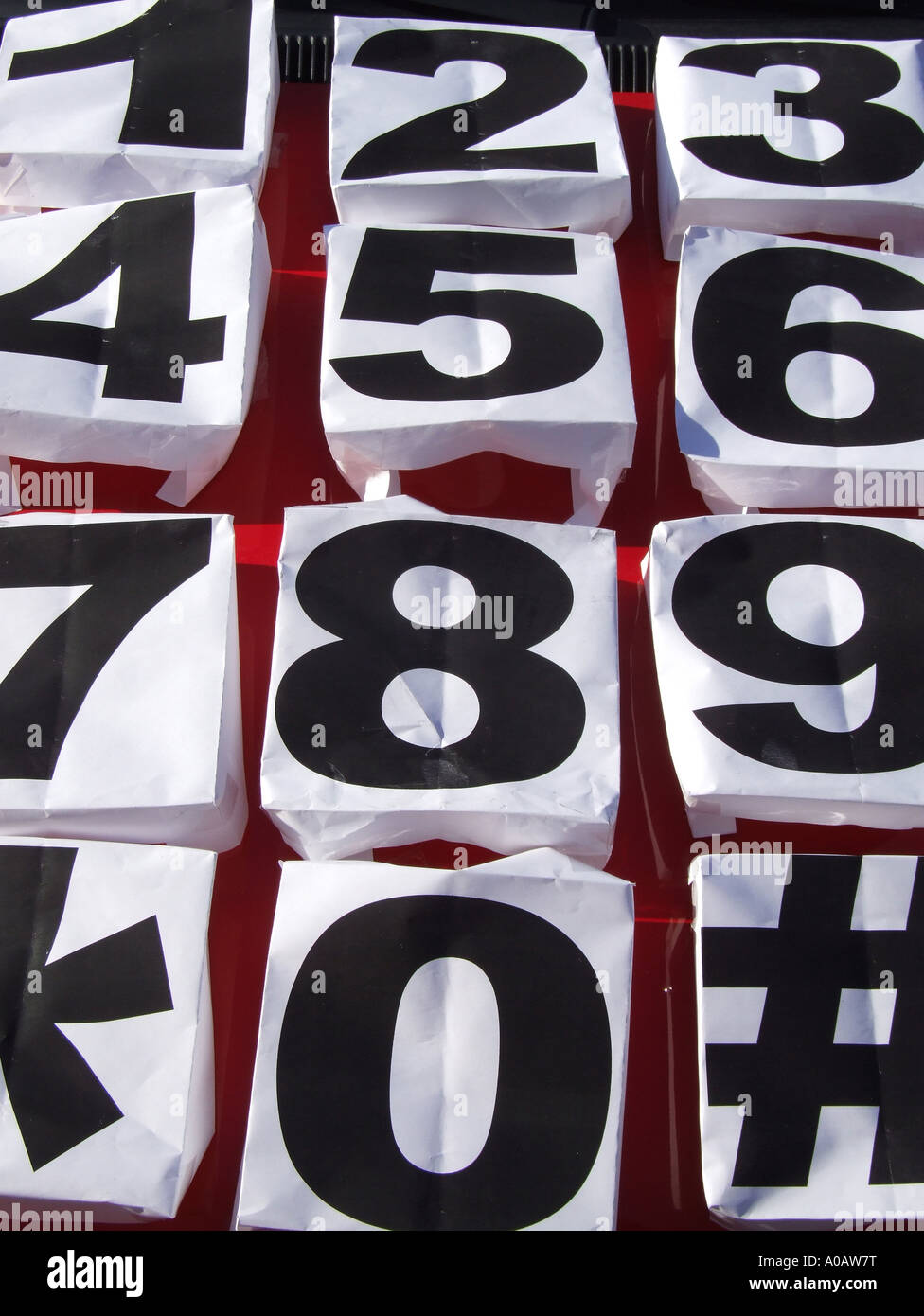 paper sculpture push button phone numbers Stock Photo - Alamy