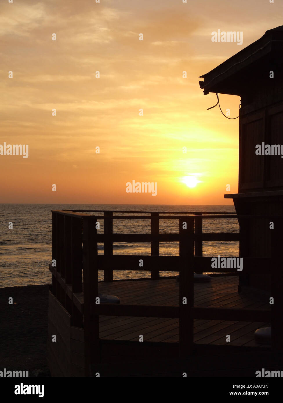 one beach hut and sunset Stock Photo - Alamy