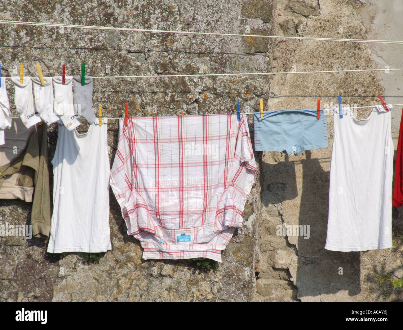 clean clothes on washing line Stock Photo - Alamy