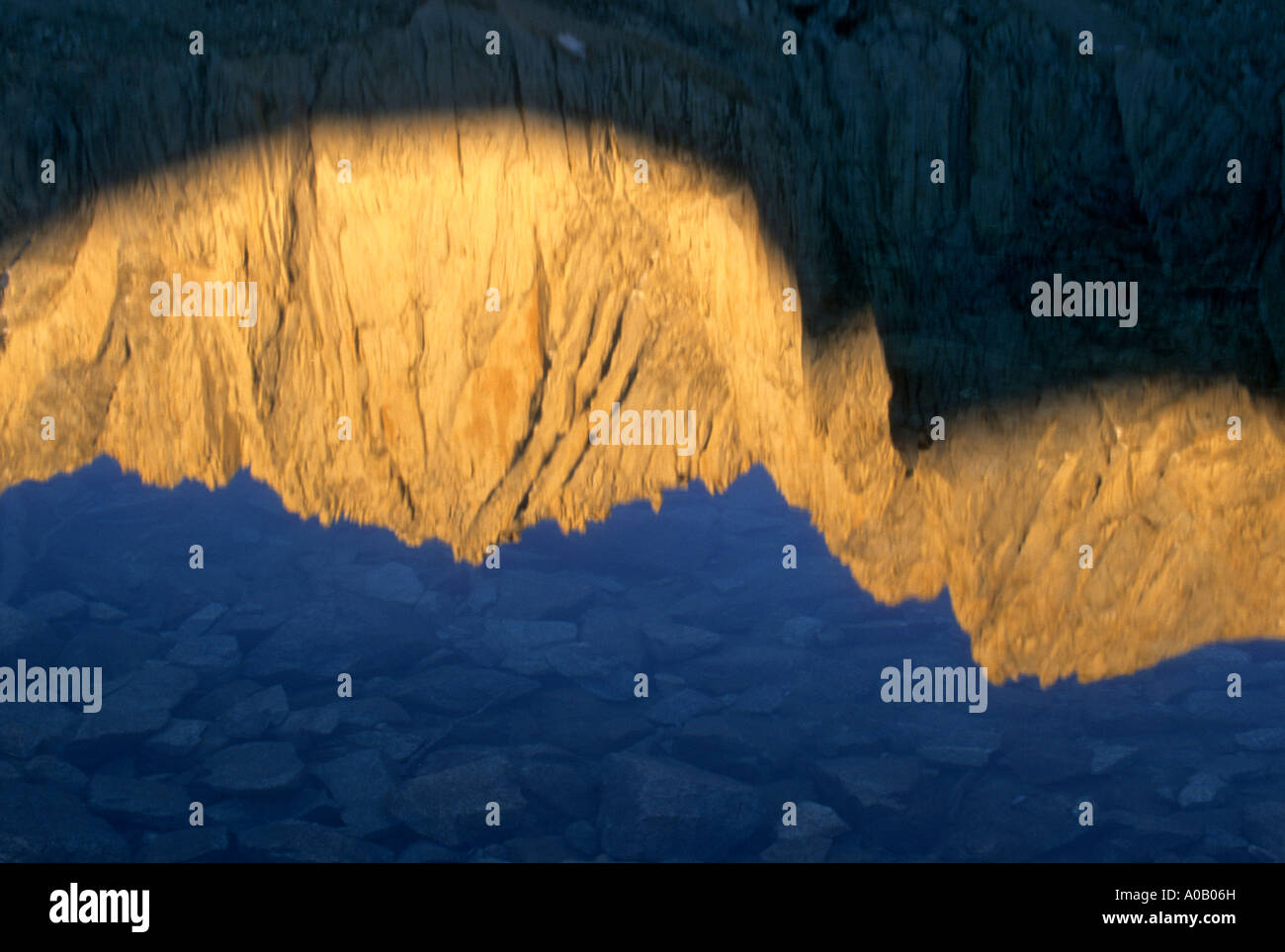 Reflection of cliffs in Ruby Lake in the John Muir Wilderness, Inyo ...