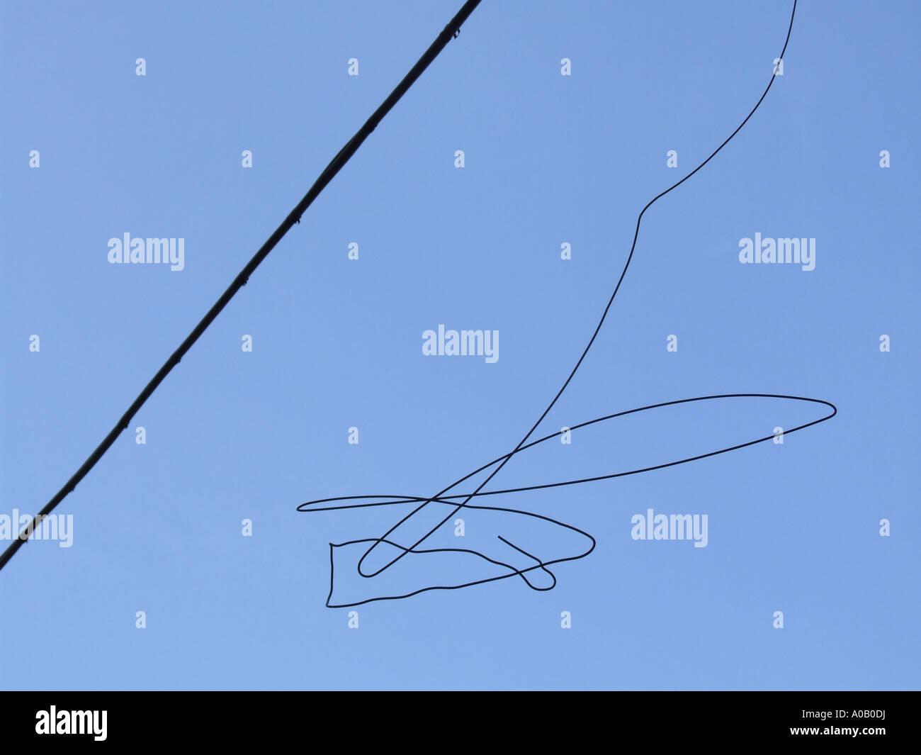 folded metal wire against blue sky Stock Photo - Alamy