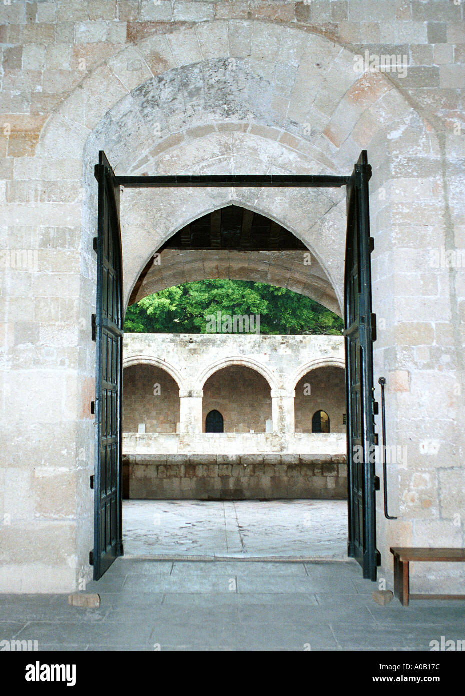 Opened iron gates on an arched doorway Rhodes Greece Stock Photo - Alamy