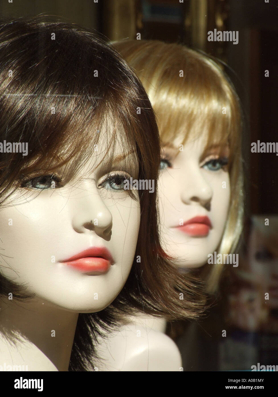 mannequins in shop window Stock Photo - Alamy