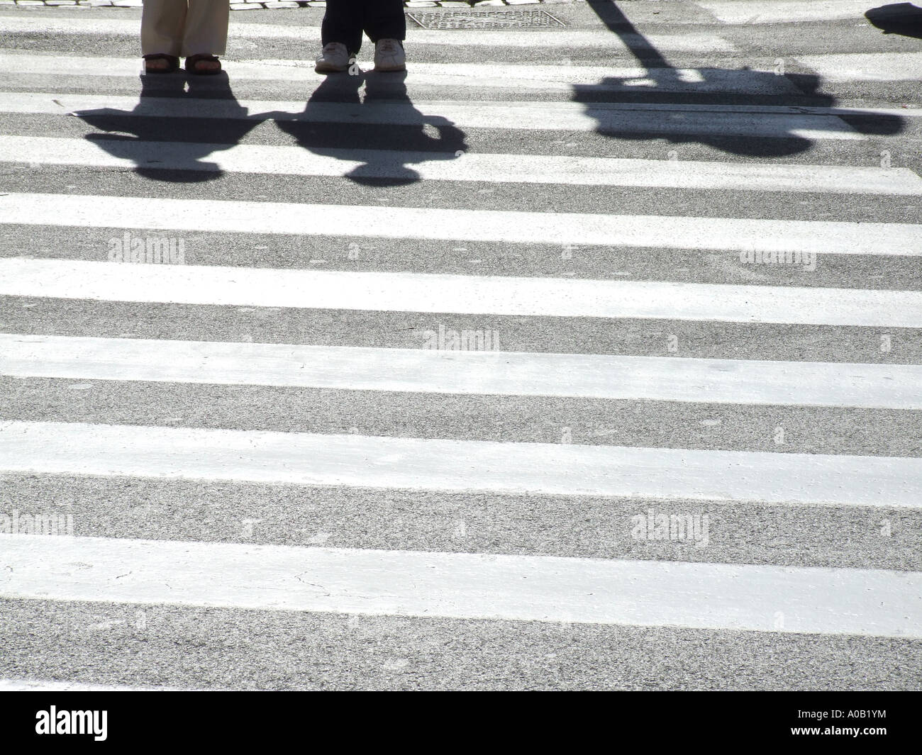 Hold hands crossing the road hi-res stock photography and images - Alamy
