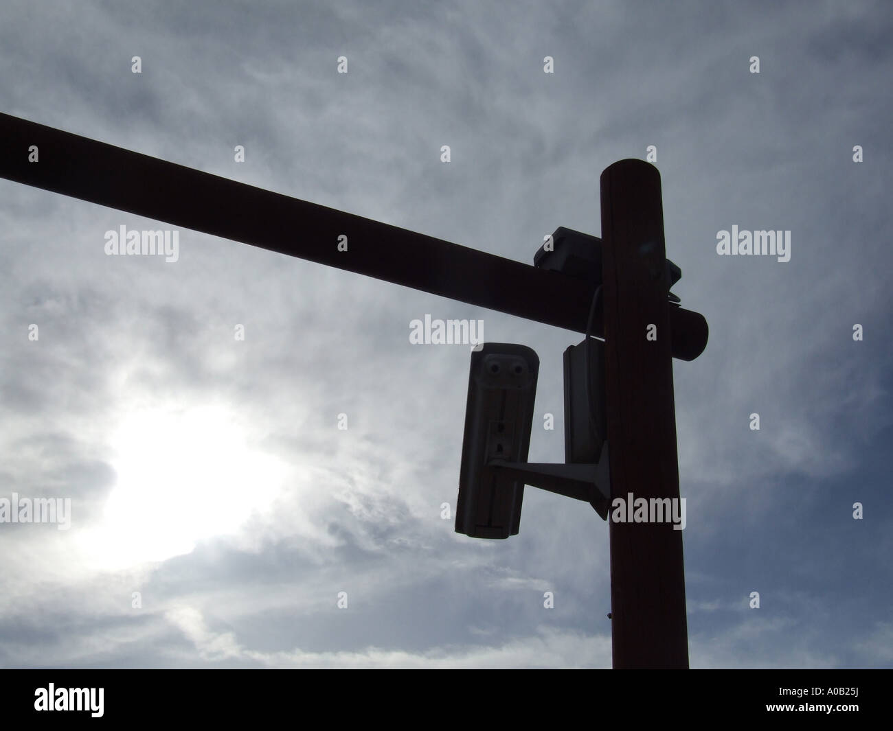 one cctv camera in silhouette Stock Photo - Alamy