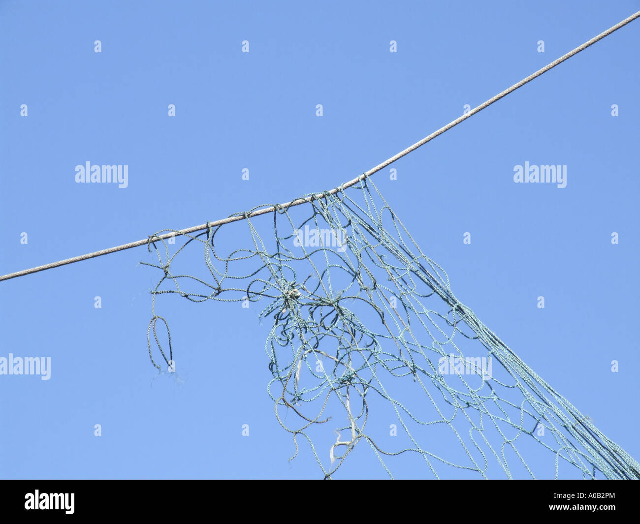 tangled net at sports centre Stock Photo - Alamy