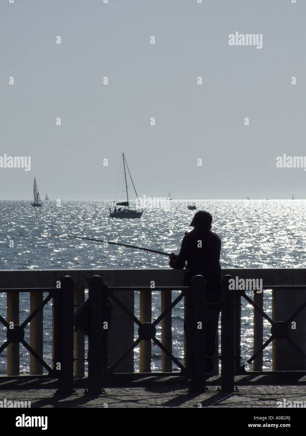 person fishing in sea Stock Photo - Alamy