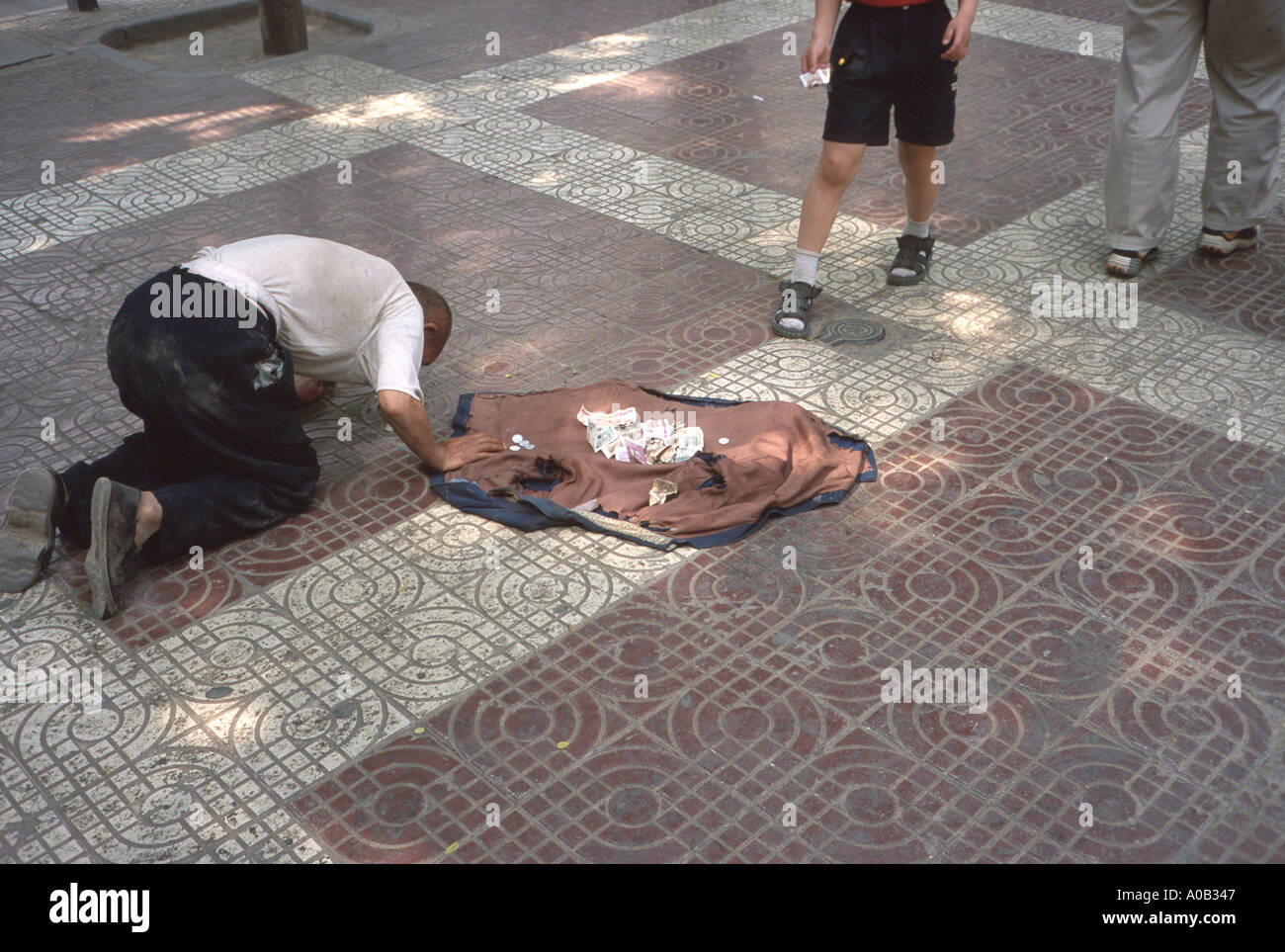 Chinese beggar hi-res stock photography and images - Alamy