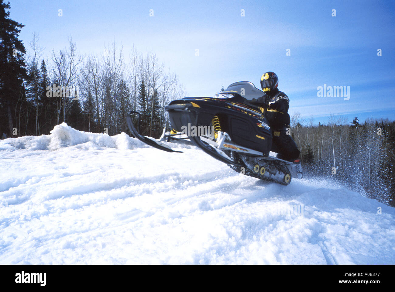 Snowmobile jumping extreme snowmobiling hi-res stock photography and ...