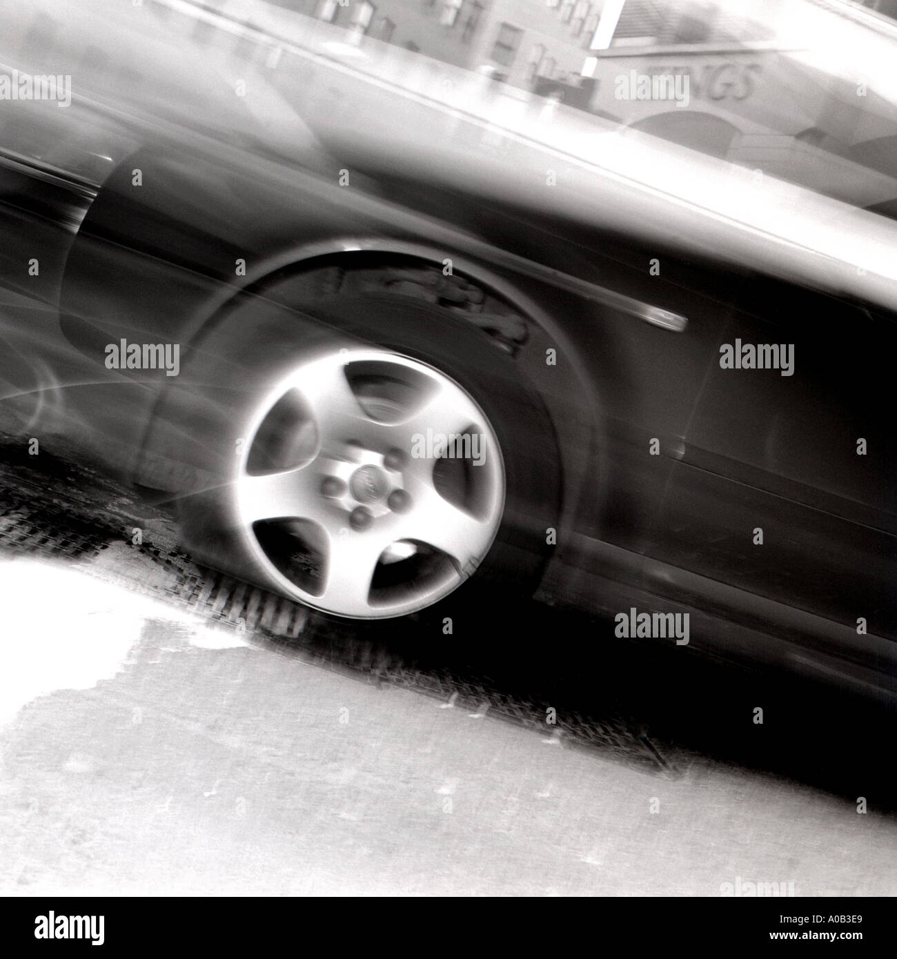 Fast moving car wheel Stock Photo - Alamy