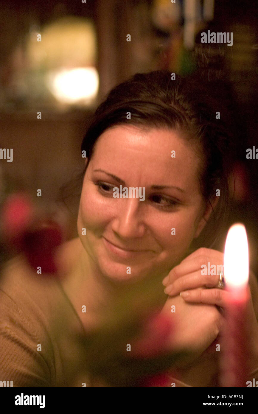 Attractive woman age 38 enjoying a romantic candlelight dinner. St Paul ...