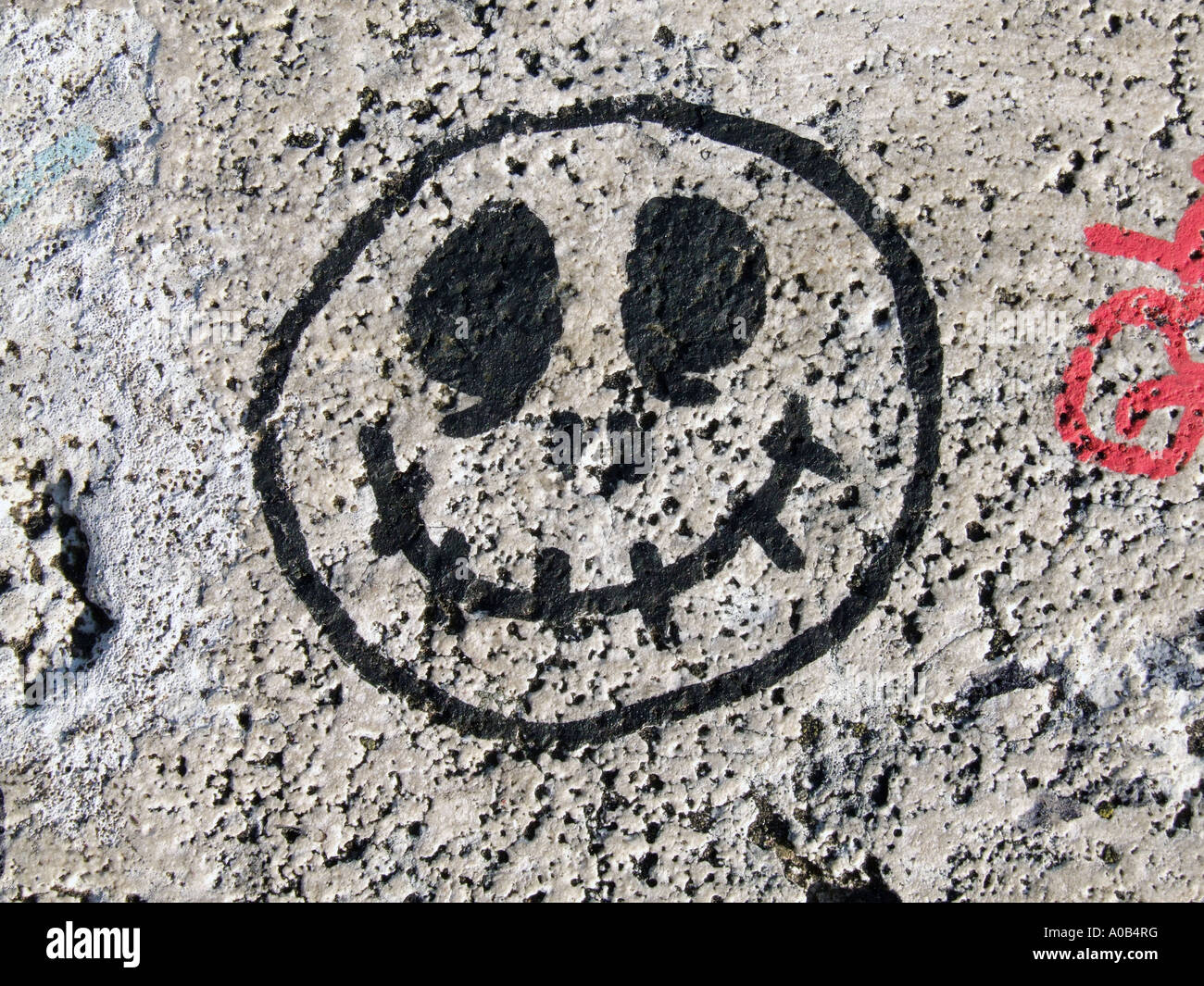 smiley face graffiti on wall Stock Photo - Alamy