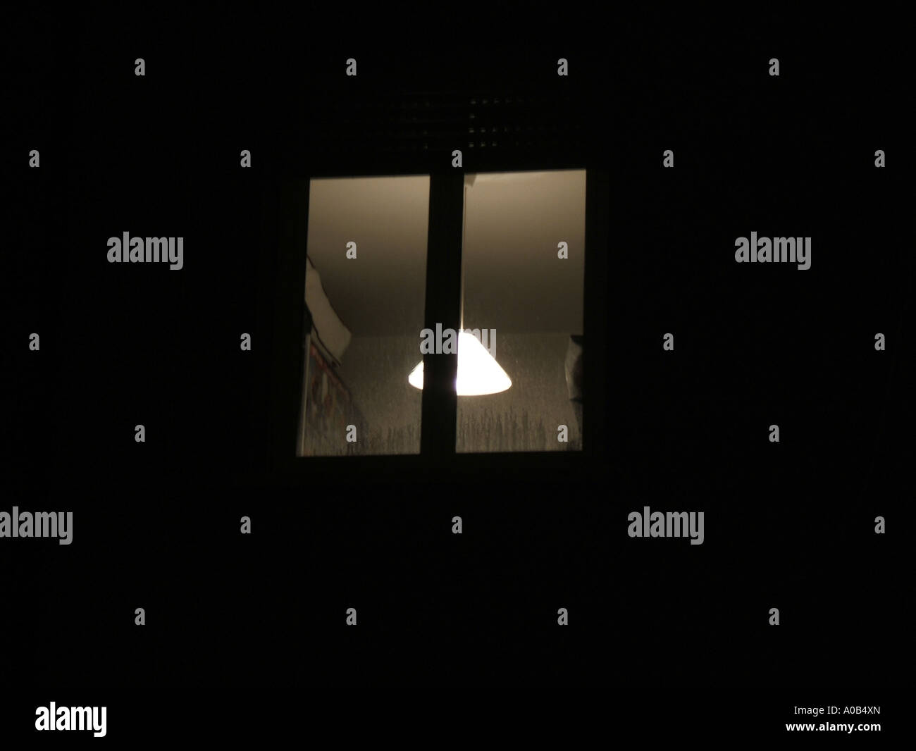 lonely window at night Stock Photo - Alamy