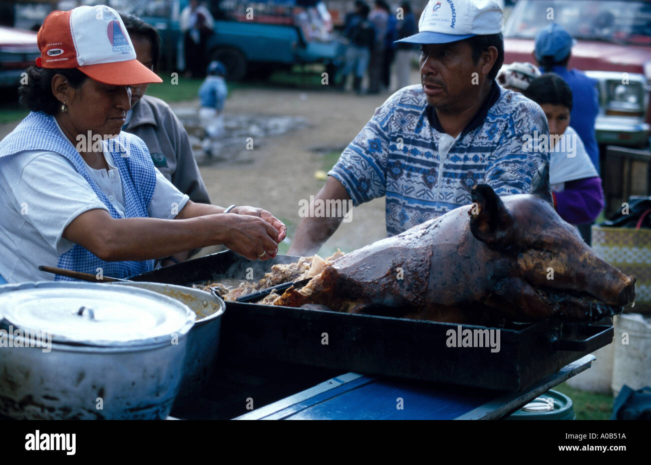 Food selling pig on the market in Otavalo Stock Photo - Alamy