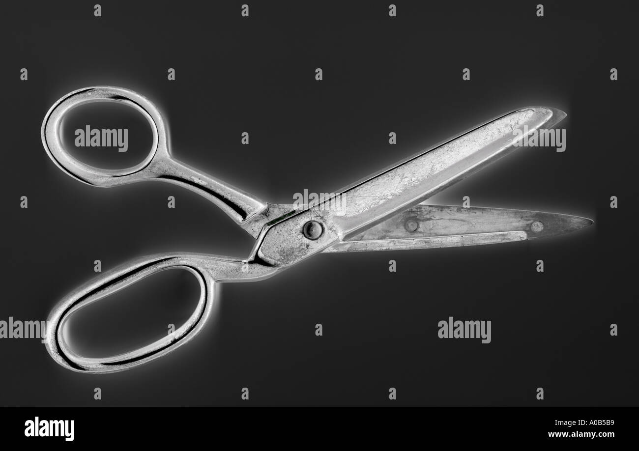 Scissors cut Black and White Stock Photos & Images - Alamy