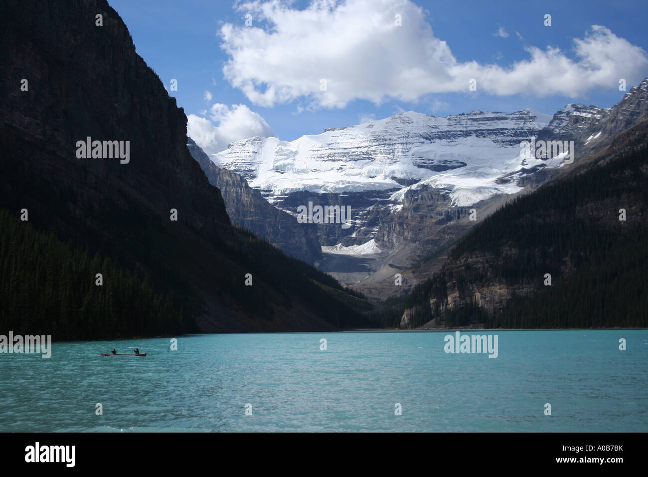 canoe on turquoise waters of Lake Louise Canadian Rockies September ...