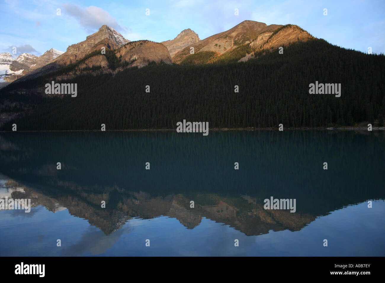 Mount Whyte and Mount Niblock reflected in Lake Louise Canadian rockies ...