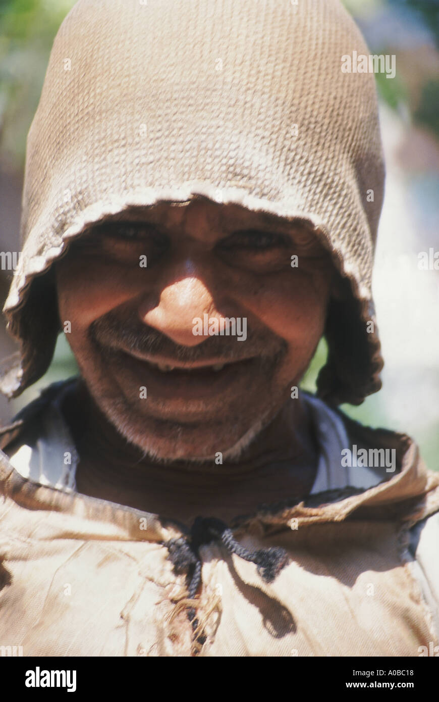 Smiling beggar hi-res stock photography and images - Alamy