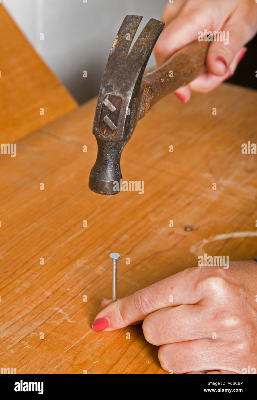 Careful hammering hi-res stock photography and images - Alamy