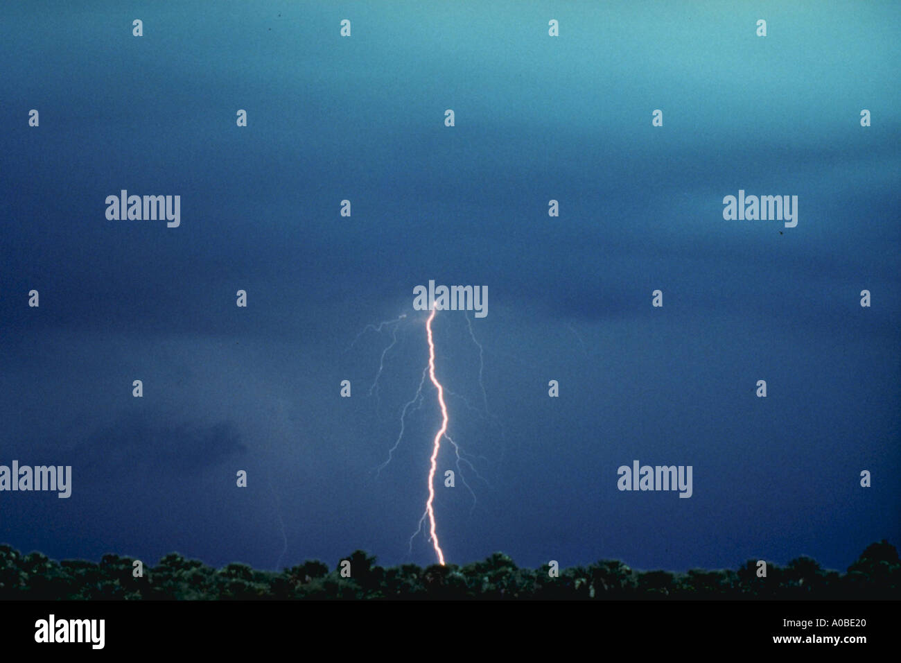 Lightning bolt striking the ground during a storm Stock Photo - Alamy