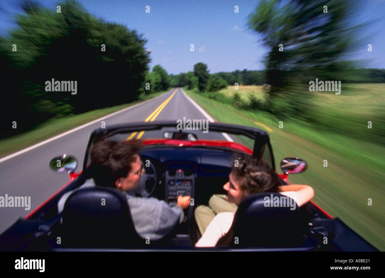 Woman driving convertible highway hi-res stock photography and images ...