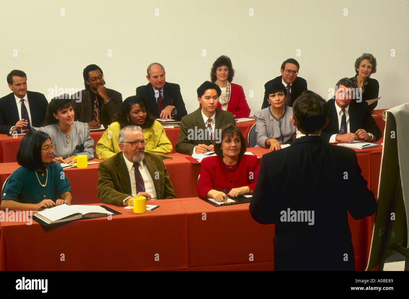 Man giving a group presentation model released Stock Photo - Alamy