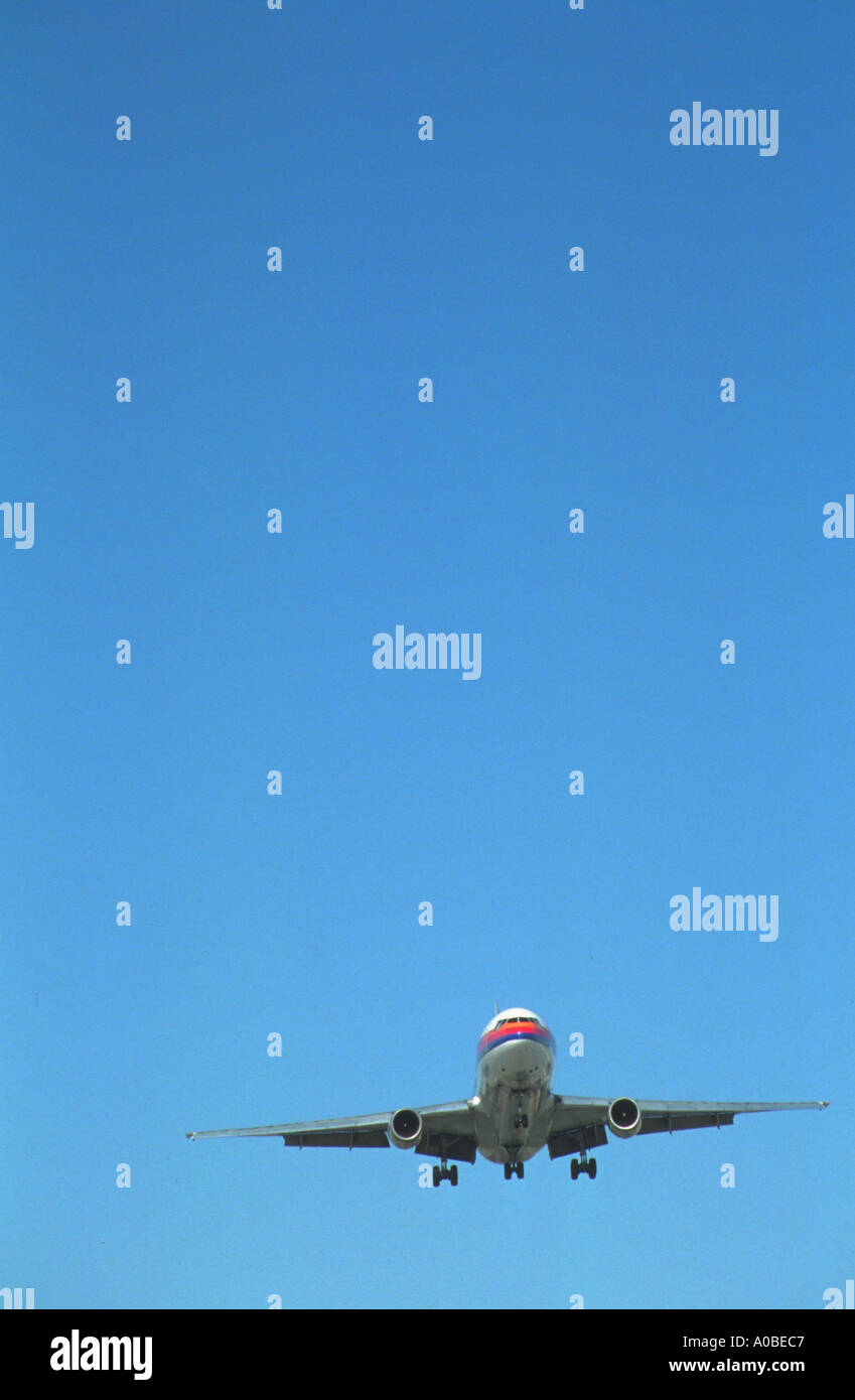 Airplane landing at LAX International Airport California Stock Photo ...