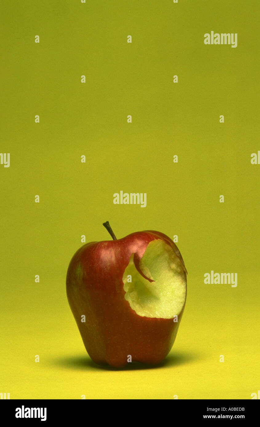 Bite out of an apple in studio Stock Photo - Alamy