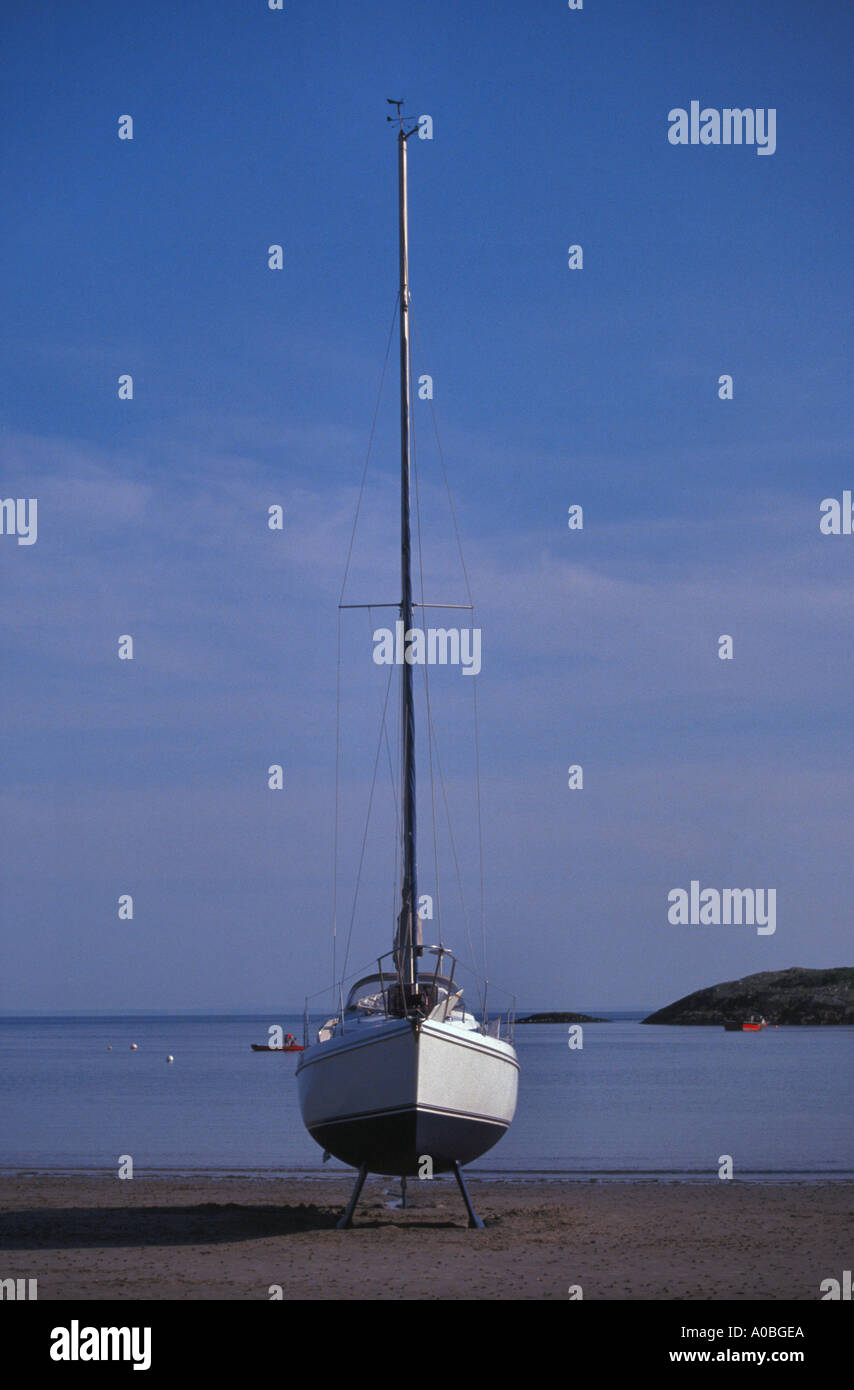 Sailboat on the beach at Rhoscolyn Anglesey North Wales Stock Photo - Alamy