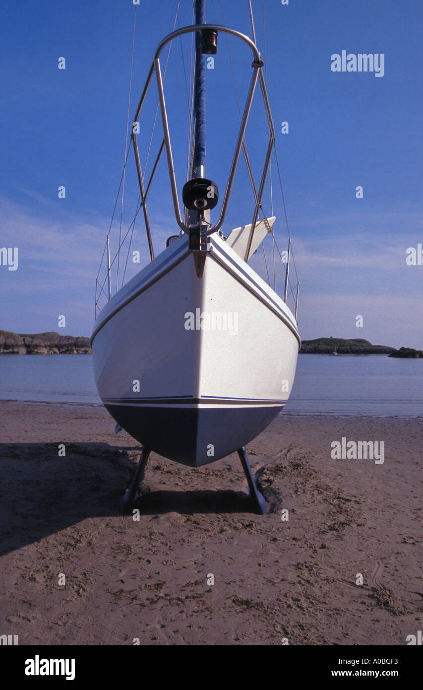 Sailboat on the beach at Rhoscolyn Anglesey North Wales Stock Photo - Alamy