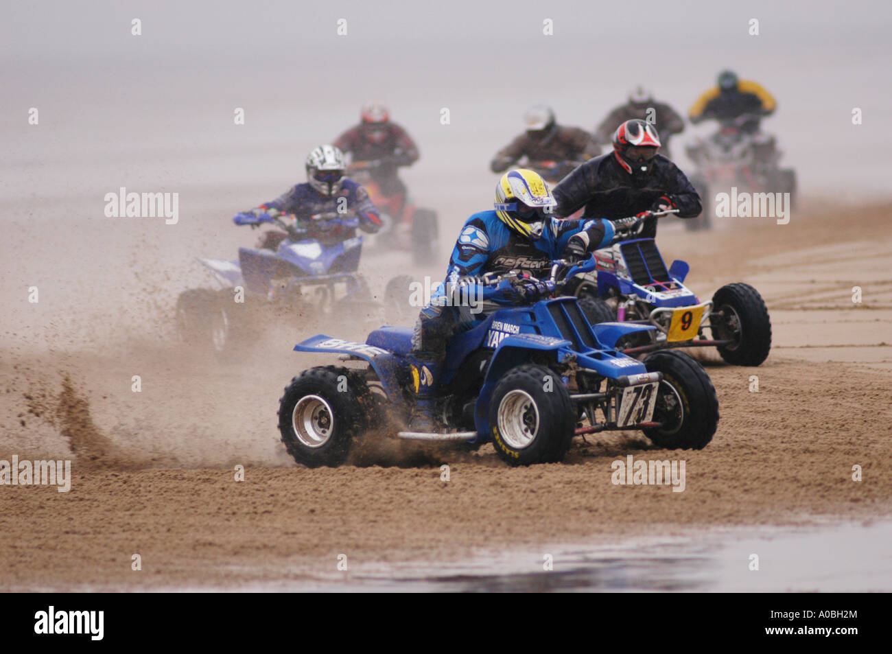 Sand racing quad bike event on a beach in england Stock Photo - Alamy