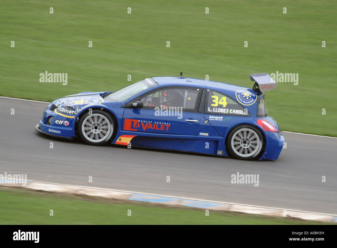 Renault megane racing car speeding around a race track in the uk Stock ...