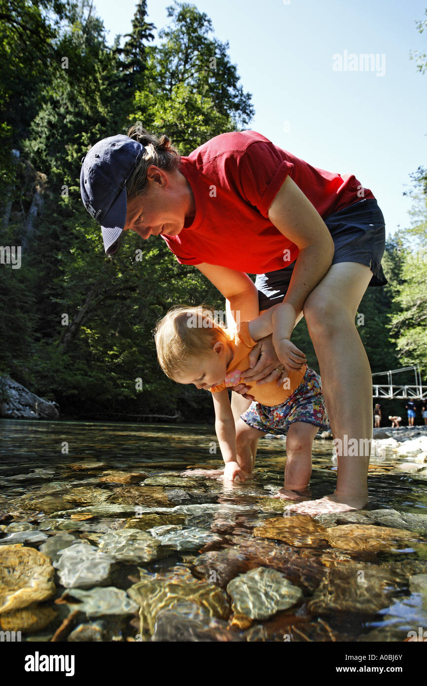 Stooping Woman Holding High Resolution Stock Photography and Images - Alamy