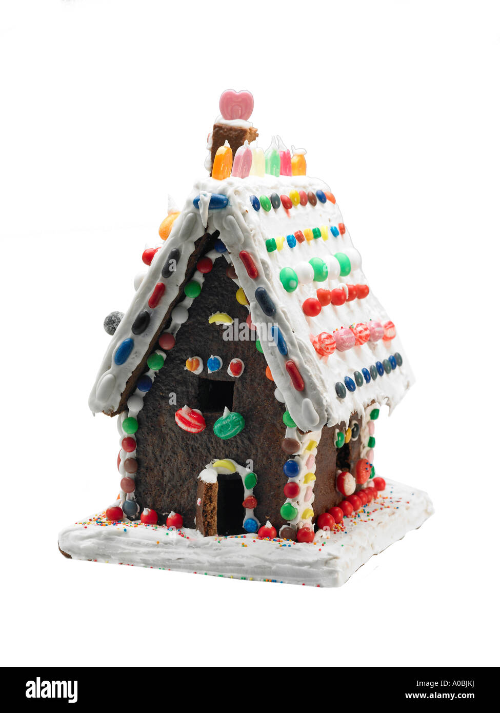 traditional ginger bread house covered in sweets and icing Stock Photo ...