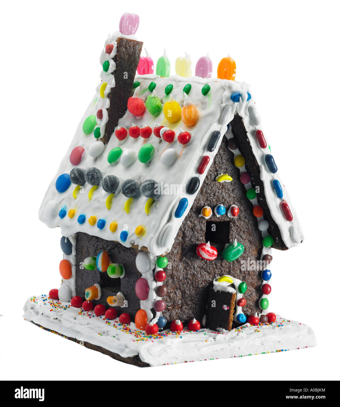 traditional ginger bread house covered in sweets and icing Stock Photo ...