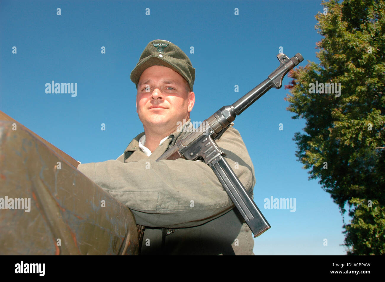 Actor in real German world war 2 uniform WW11, with with machine gun ...
