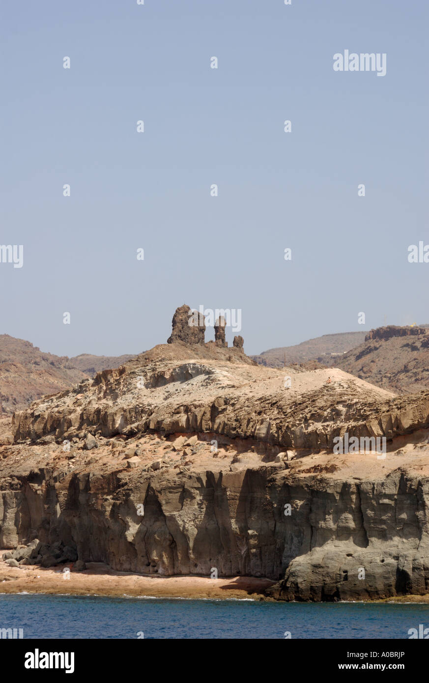 Strange rock formations and shapes seen from the ocean between Playa ...