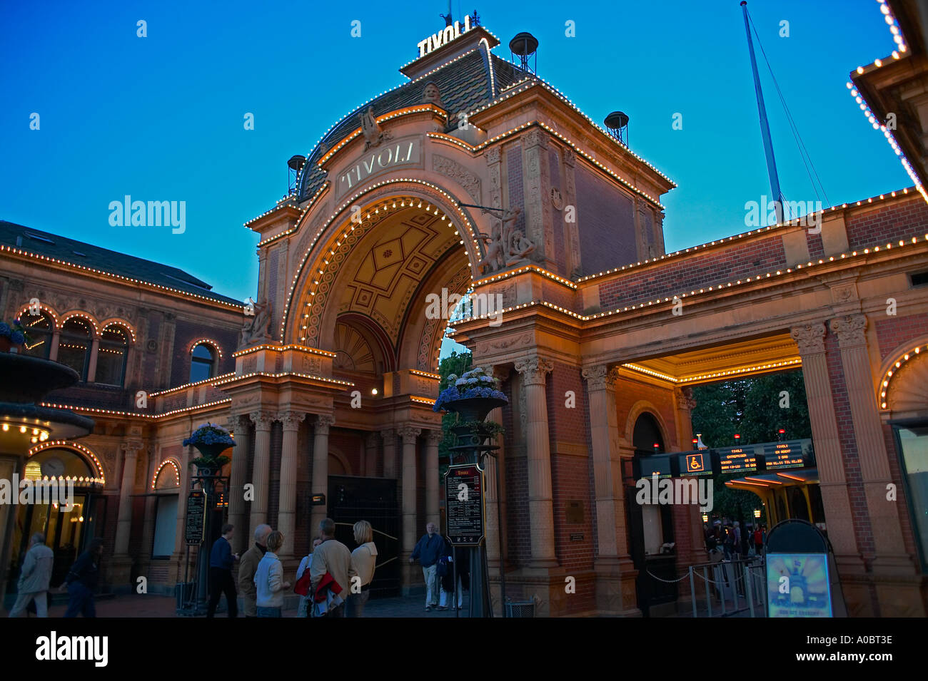 Tivoli gardens, amusement park main entrance at dusk, Copenhagen ...