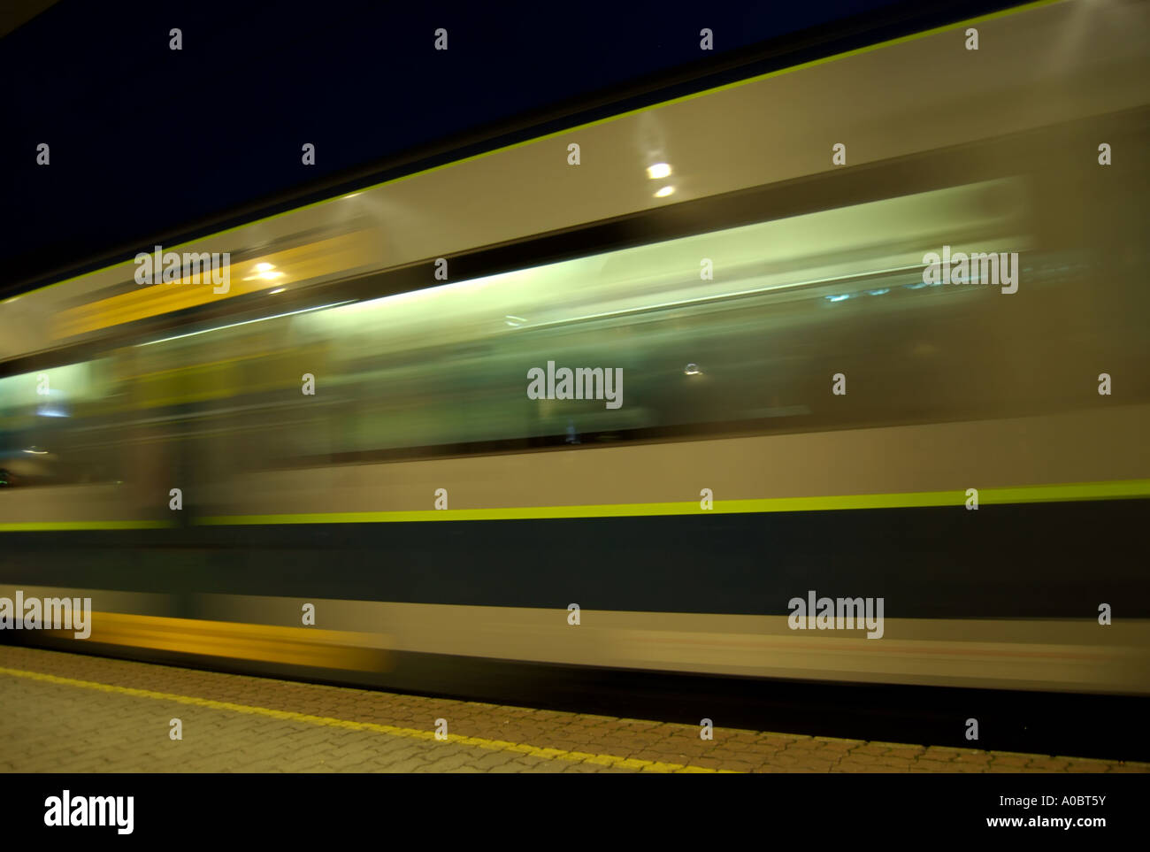 A train coupe going by at great speed in the night This image is part ...