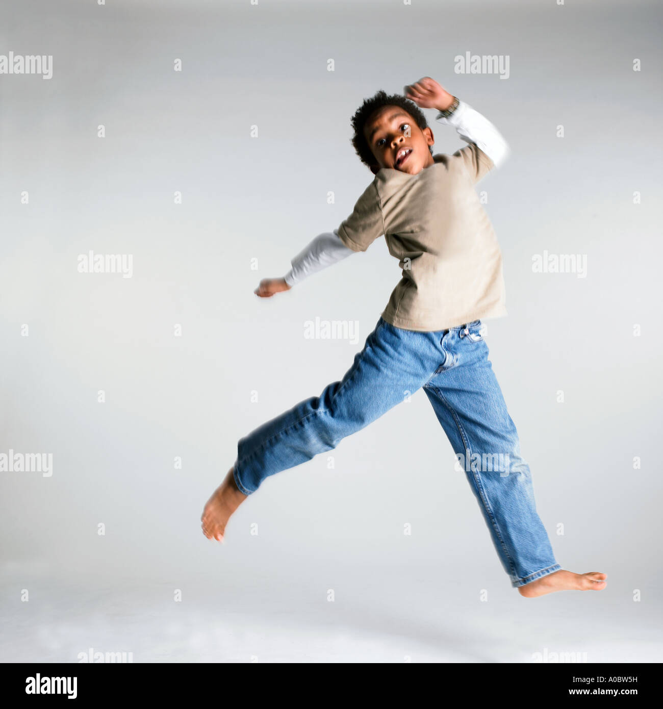 Boy Jumping Young boy Stock Photo - Alamy