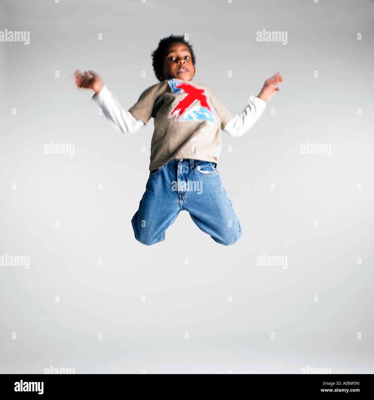 Boy Jumping Young boy Stock Photo - Alamy