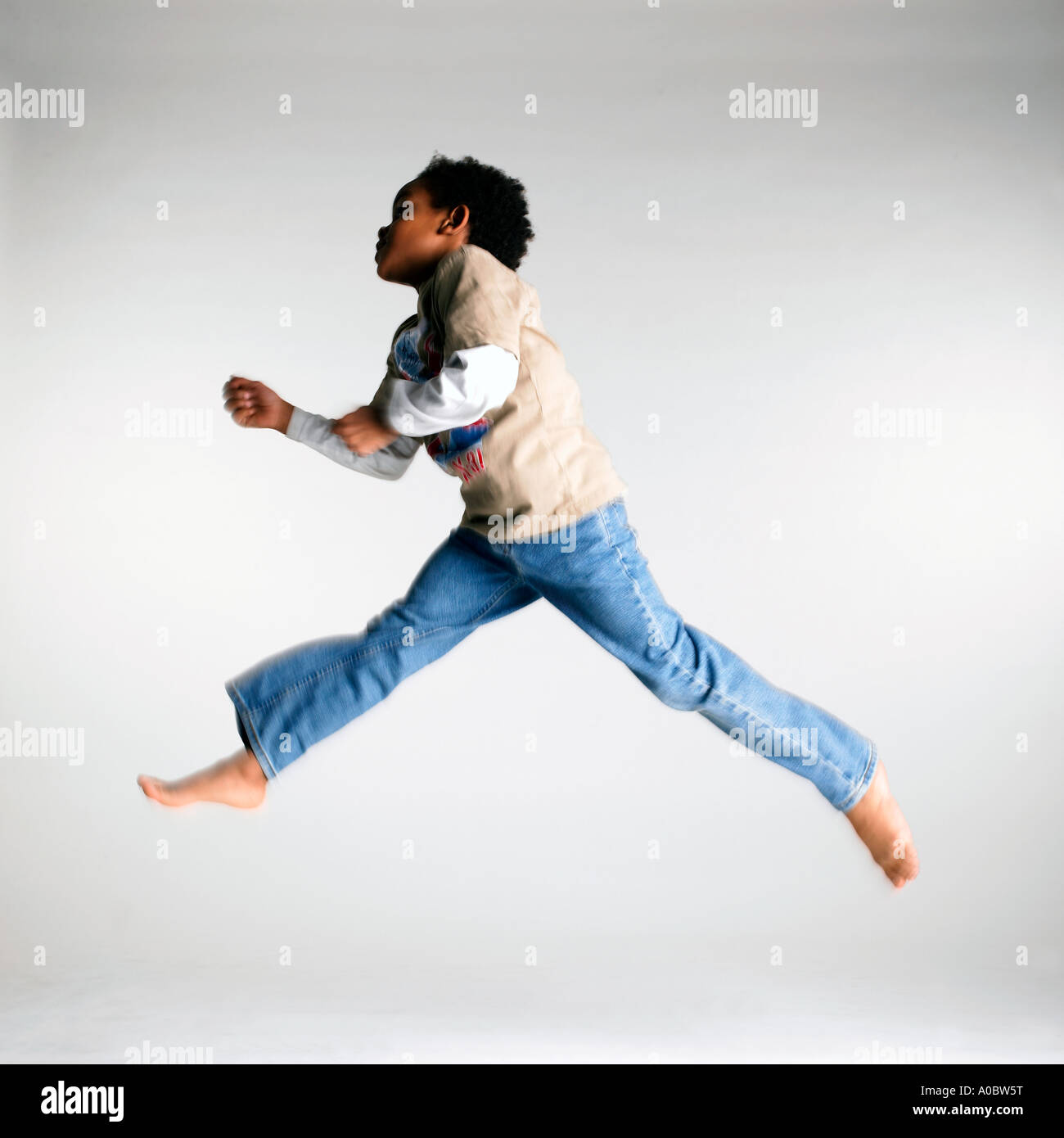 Boy Jumping Young boy Stock Photo - Alamy