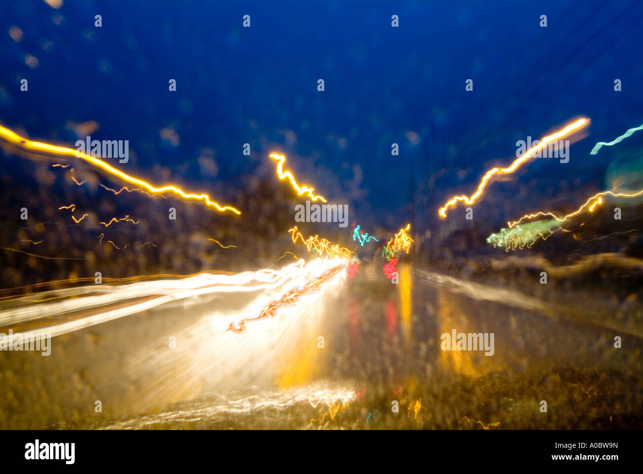Cars speeding through freeway night hi-res stock photography and images ...