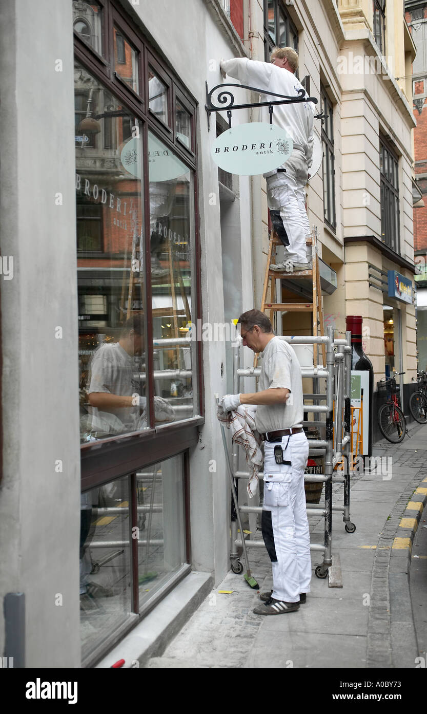 Man repainting house facade hi-res stock photography and images - Alamy