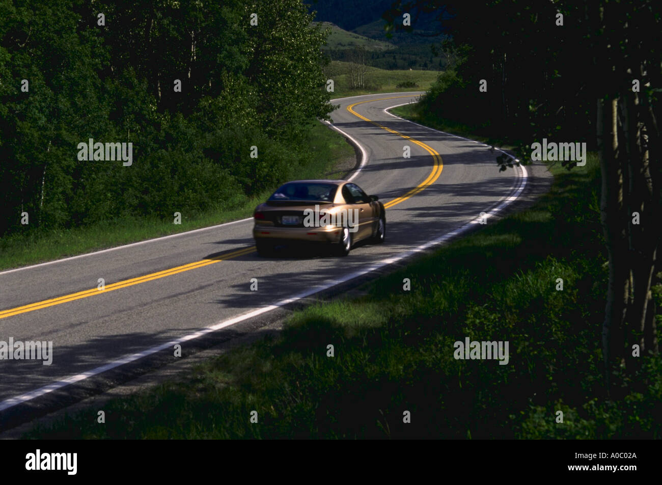 Car on winding road hi-res stock photography and images - Alamy