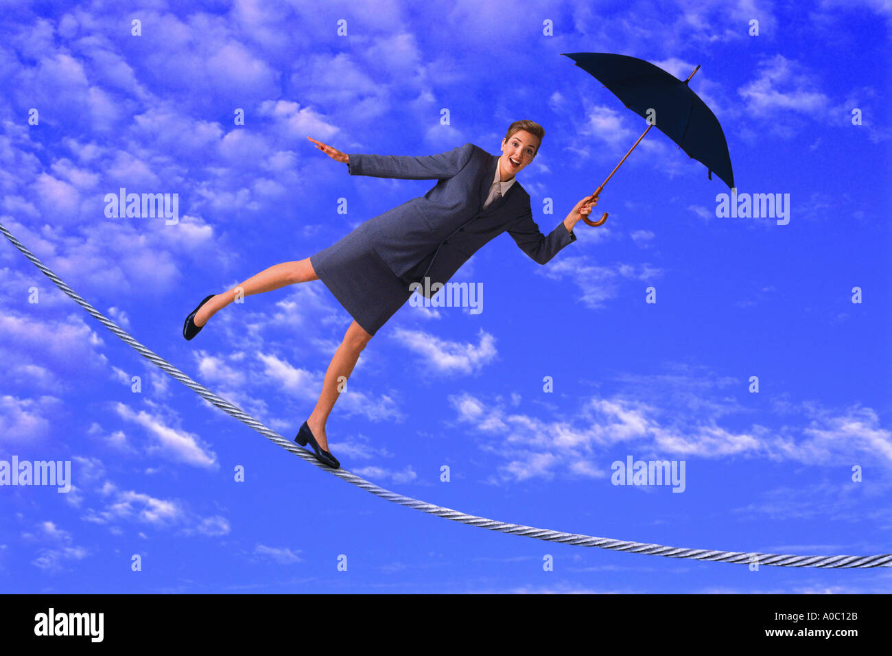 Balancing on wire hi-res stock photography and images - Alamy