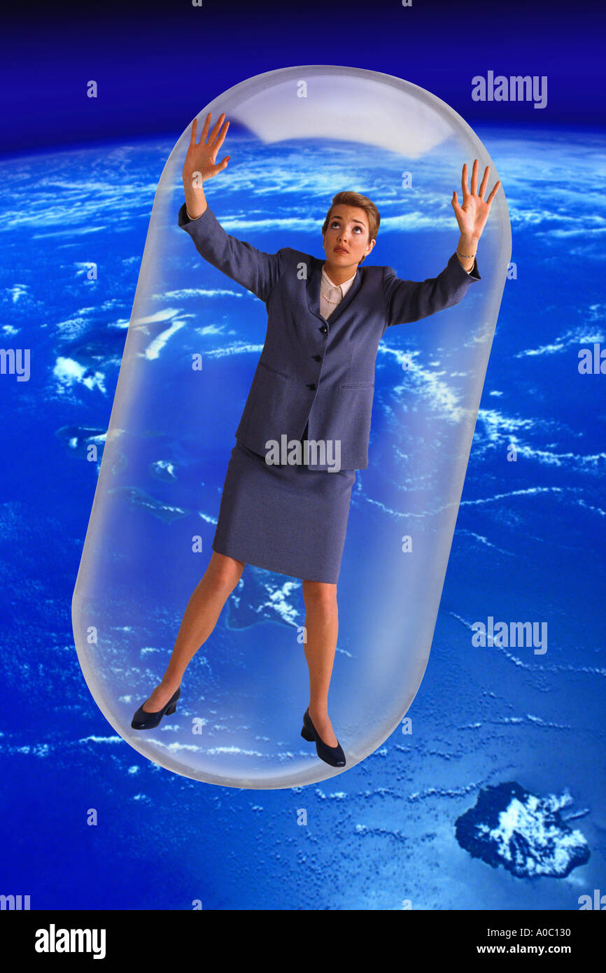 Businesswoman trapped in glass capsule Stock Photo - Alamy