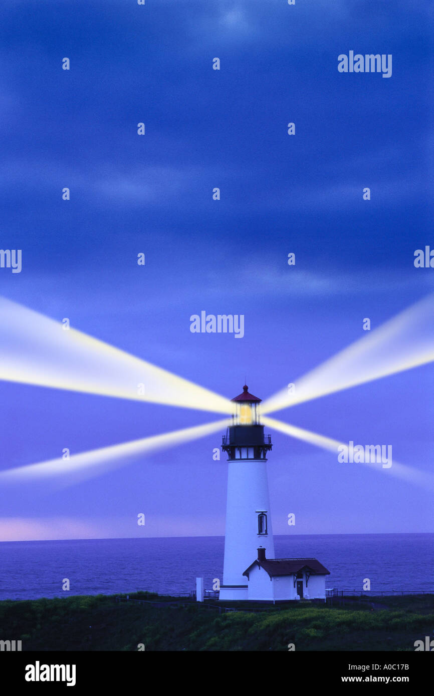 Lighthouse with light beams Stock Photo - Alamy