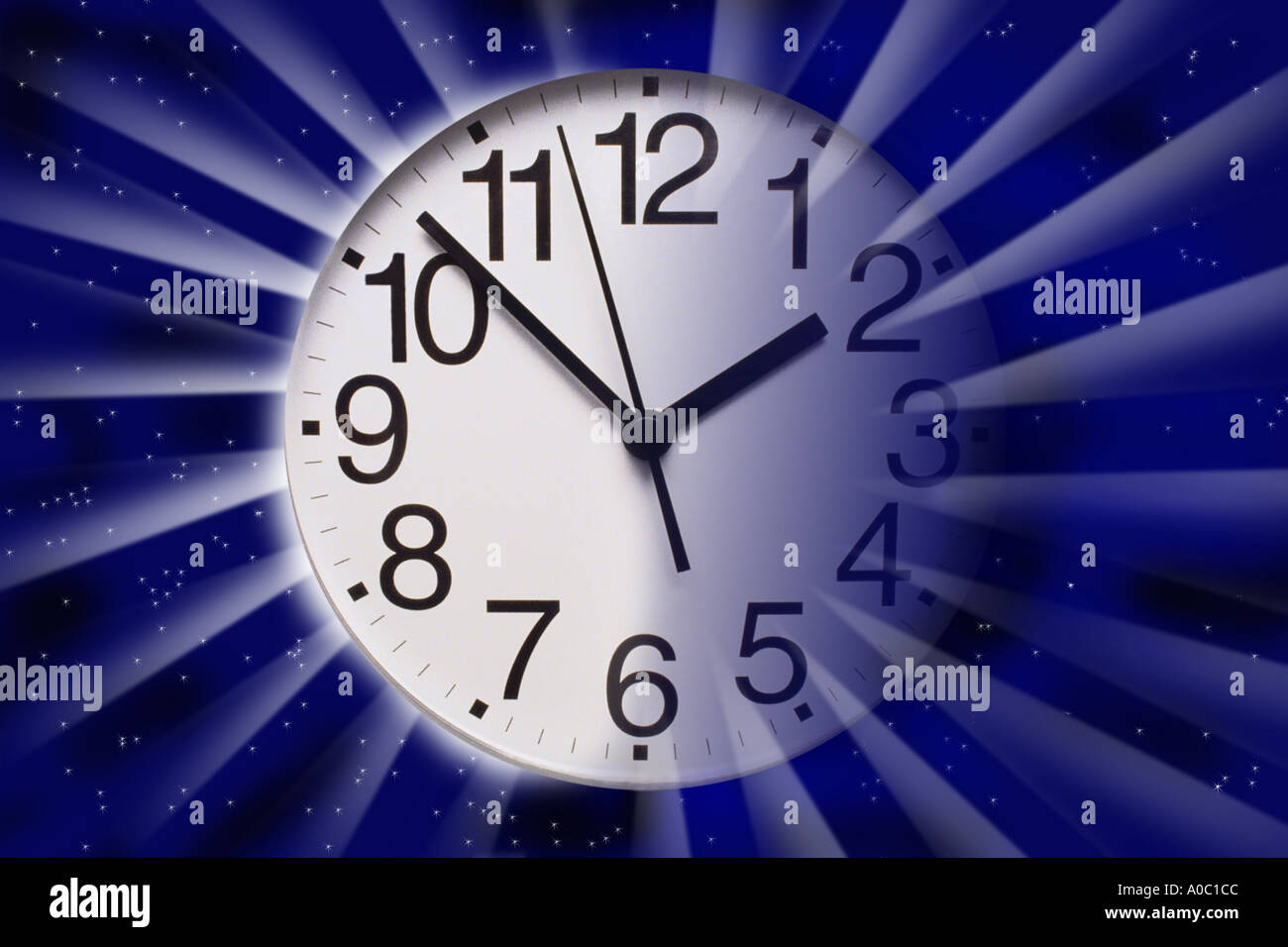 Clock with light beams Stock Photo - Alamy