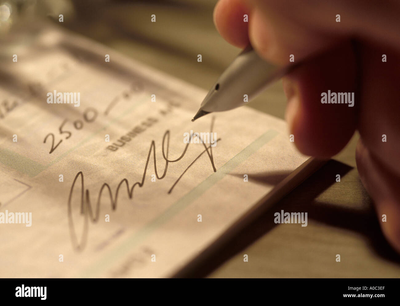 Cheque book signature hi-res stock photography and images - Alamy